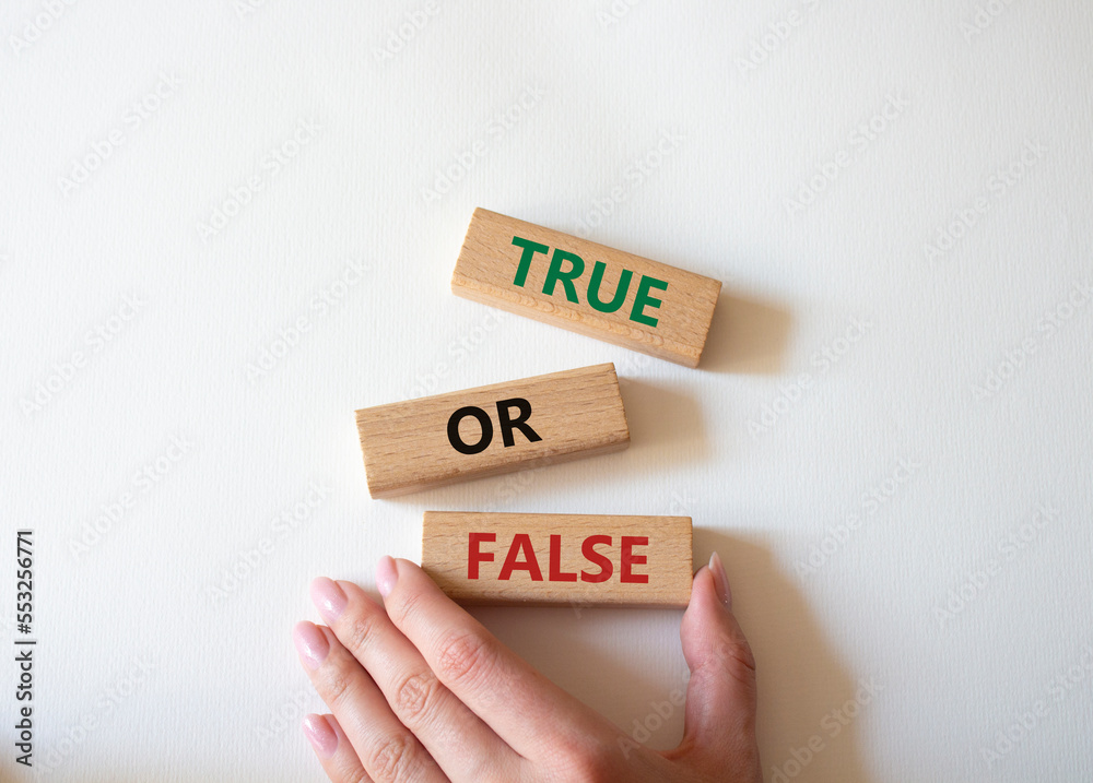 True or false symbol. Wooden blocks with words True or false. Beautiful ...