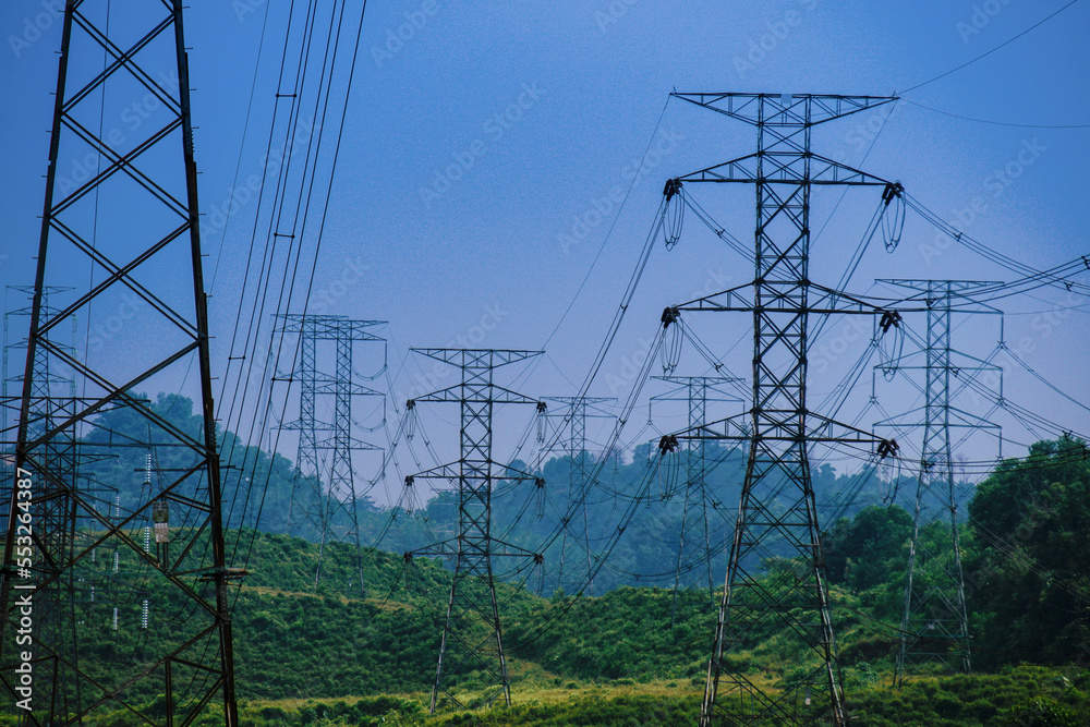 High voltage power tower industrial landscape at sunrise,urban power ...