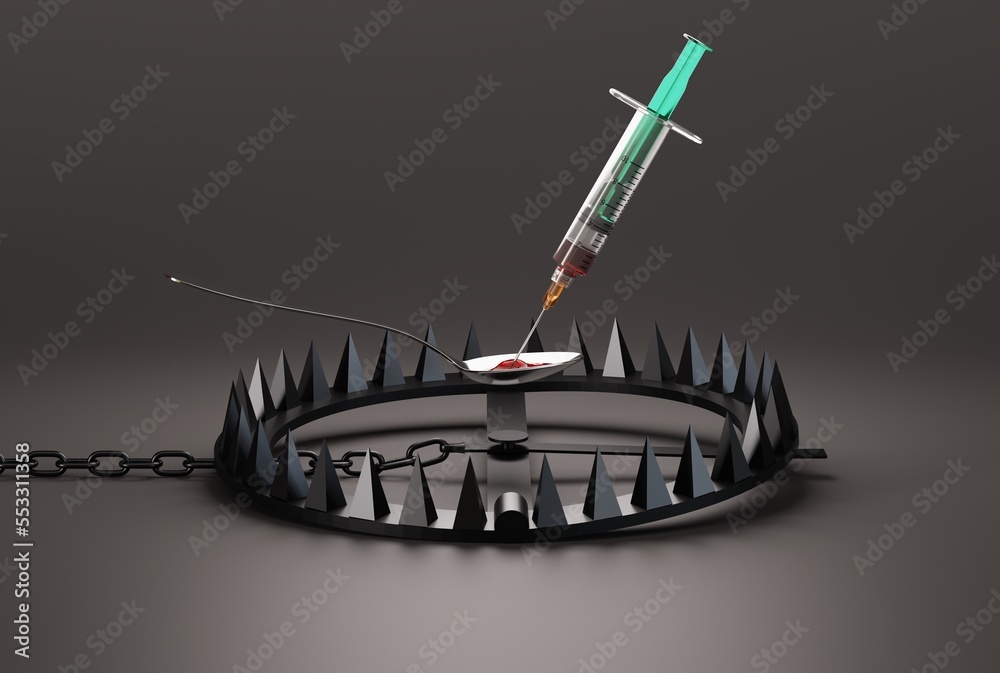 A syringe and a spoon with a drug over a snare, a trap on a dark ...