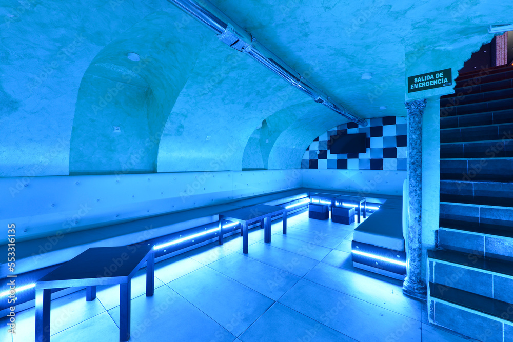 Entertainment room in an underground location with built-in stairs ...