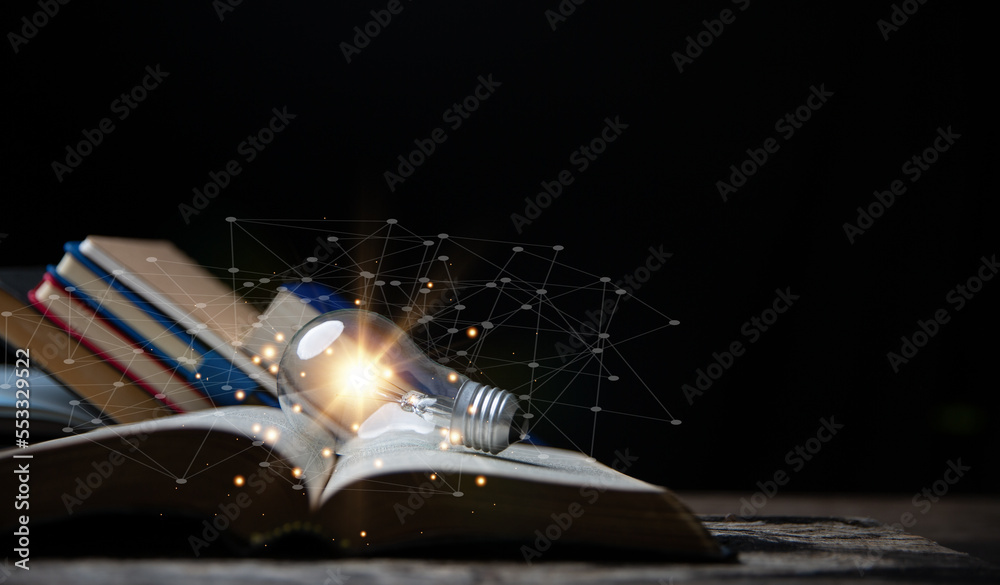 Light bulbs and books. Concept of reading books, knowledge, and ...
