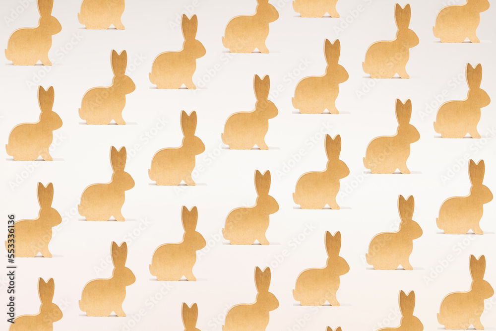 Seamless pattern of golden rabbits on a white background. Lunar ...