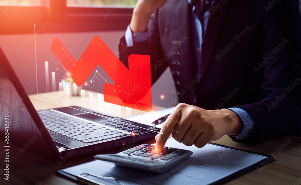 Foto de Economic collapse concept, businessman with falling financial ...