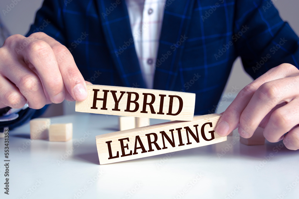 Hybrid learning symbol. Concept words 'Hybrid learning' on wooden ...