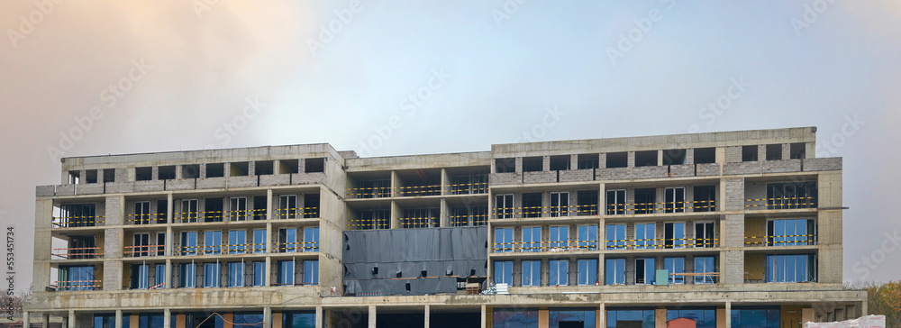 Construction of low-rise hotel complex. Construction site, building ...