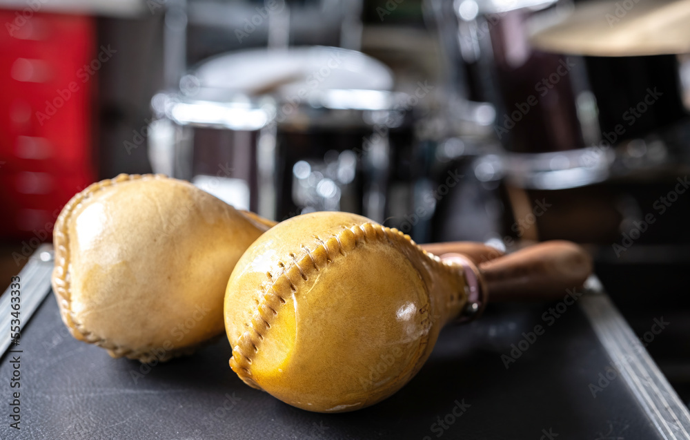 Wooden maracas for hispanic music on table in recording studio closeup ...