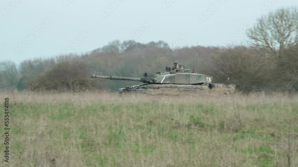 commander and gunner directing action in a British army FV4034 ...