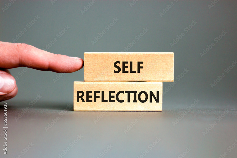 Self reflection symbol. Concept word Self reflection typed on wooden ...