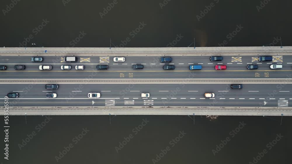 footage of bridge or road with car around river traffic bridge ...
