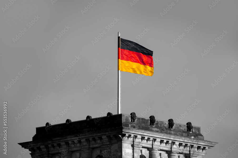 German Flag in black-red-gold color in Berlin on top of “Reichtstag ...