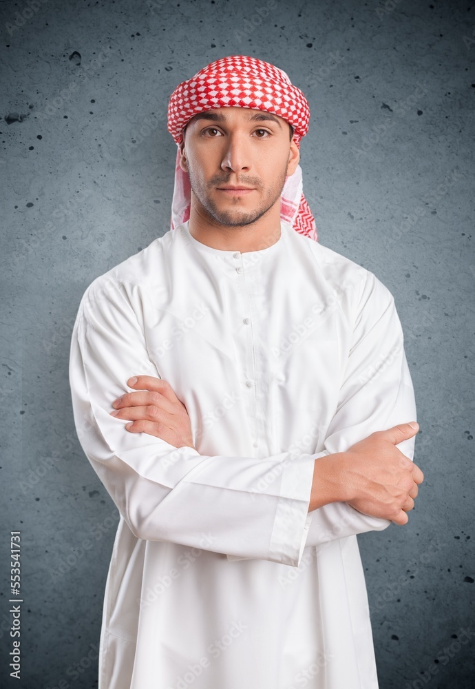 Arabian Man in Traditional Clothes posing Stock Photo | Adobe Stock