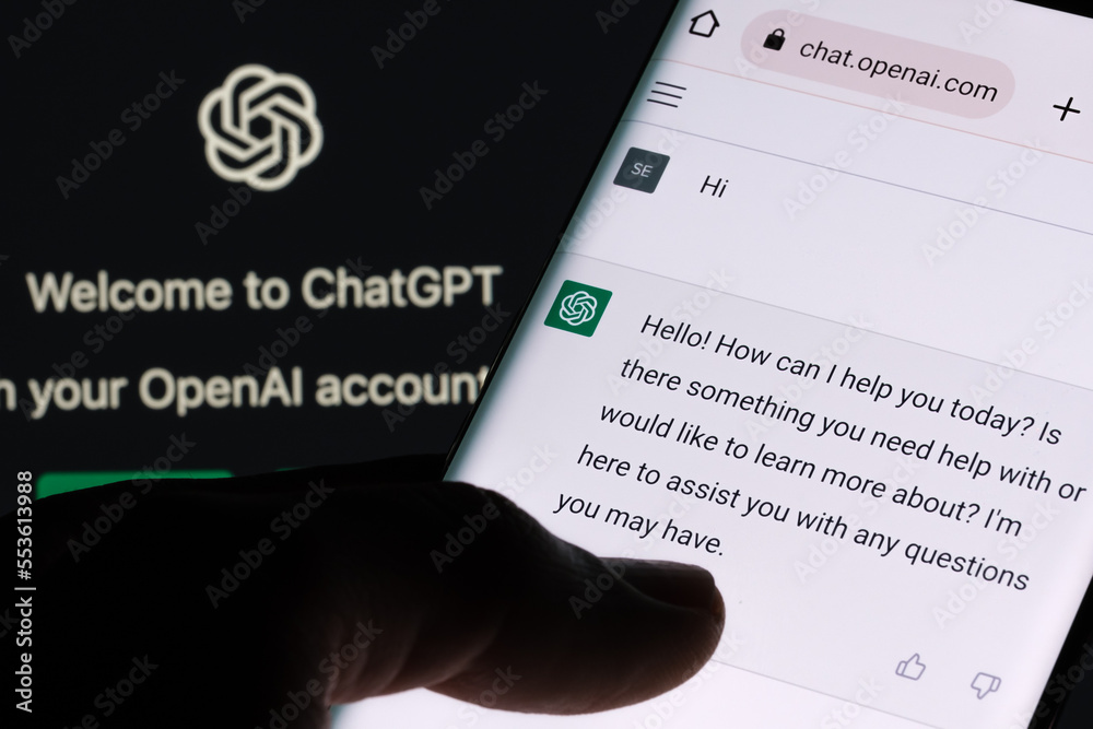 ChatGPT chat bot screen seen on smartphone and laptop display with Chat ...