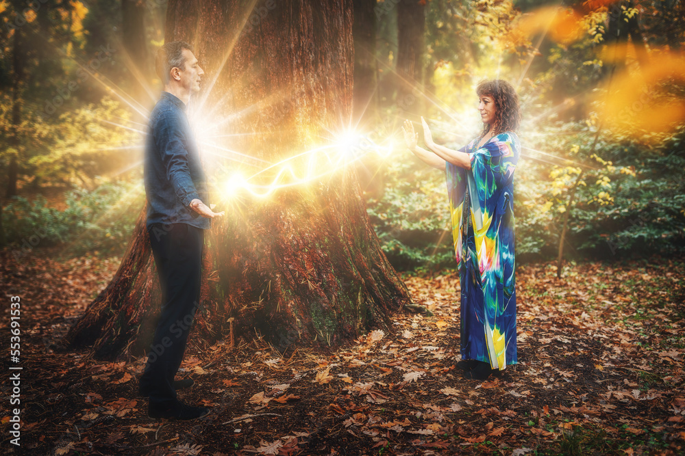 Man and woman heal each other with healing energy. Pranic healing ...