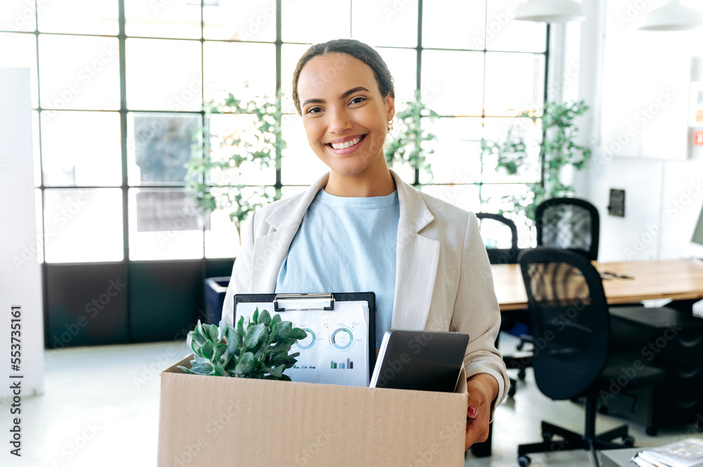 Got a new job. Joyful mixed race business lady, female trainee, in ...