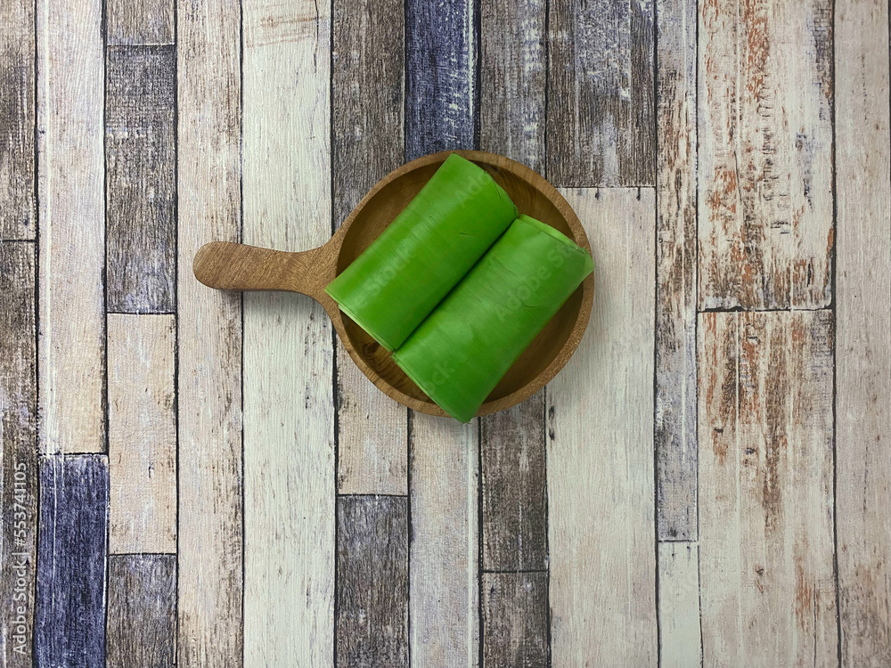 Lemper is a snack made of sticky rice, usually filled with shredded or ...