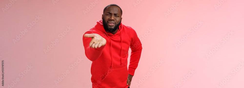 Displeased african-american man scolding friend acting bad asking what ...