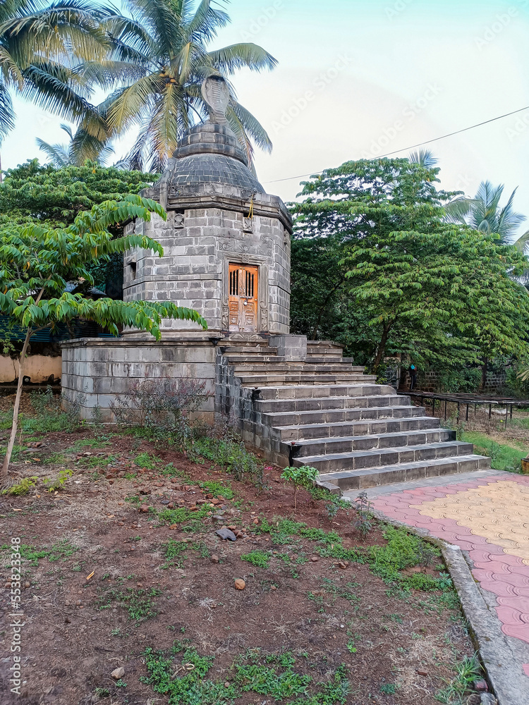 Stock photo of snake temple made up from stones, stone made snake idol ...