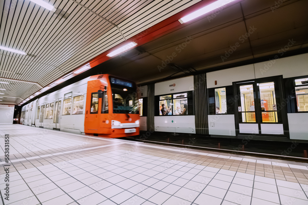 30 July 2022, Cologne, Germany: Motion blur of Arriving train in the ...