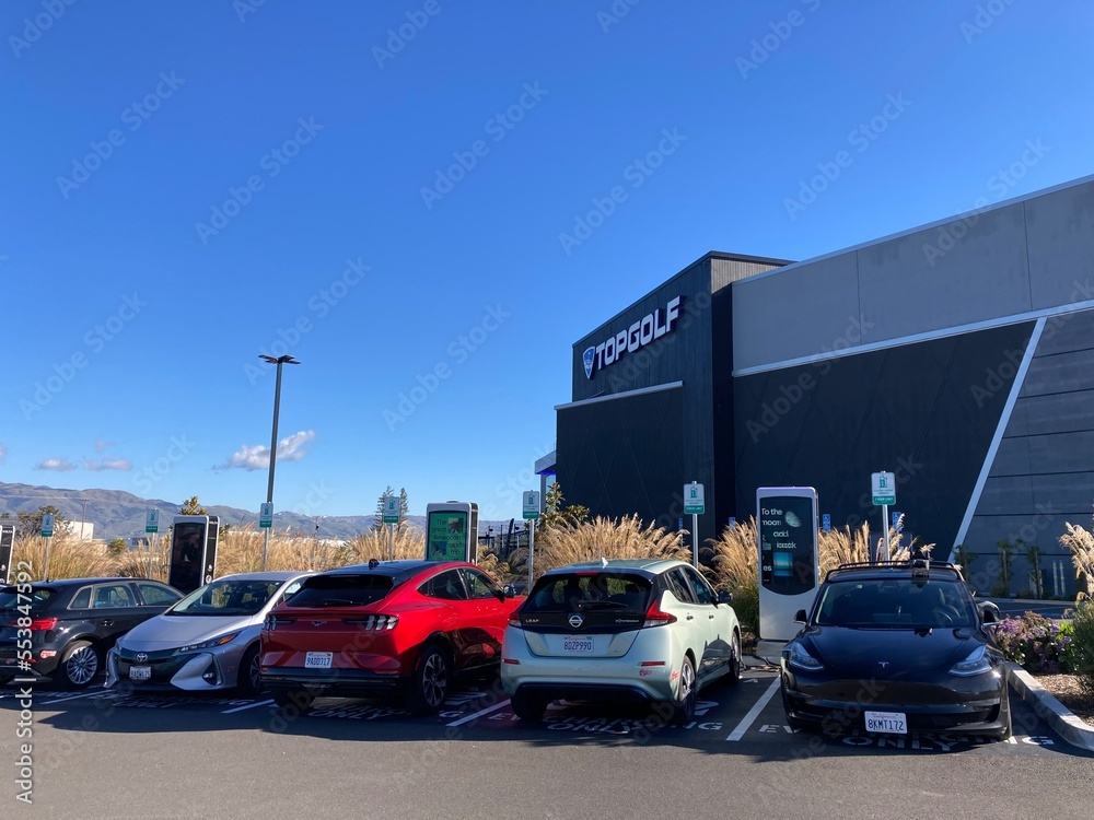 Topgolf sign, logo on the building facade of sport entertainment venue ...