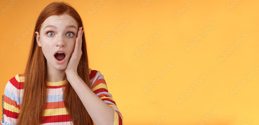 Shocked impressed concerned ginger girl drop jaw gasping stunned slap ...