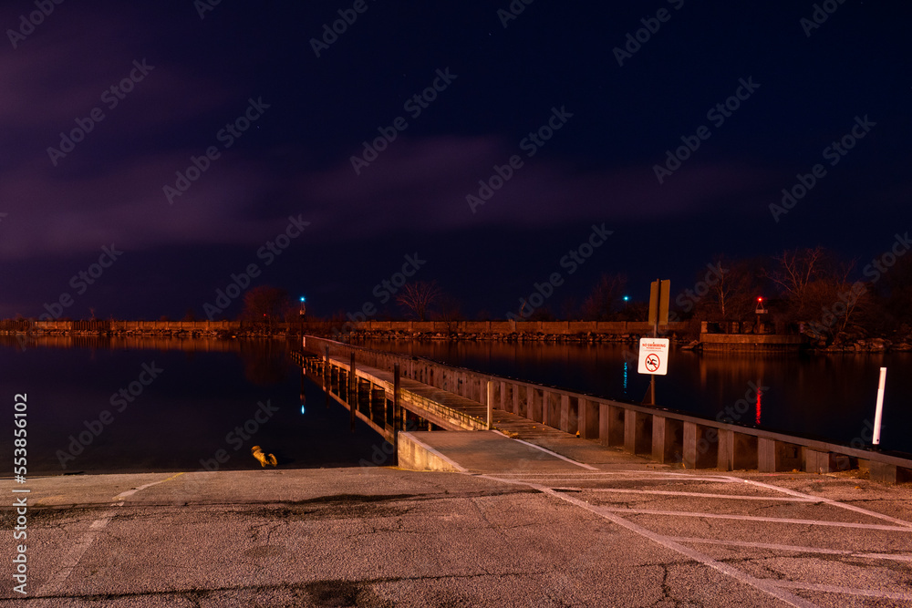 Dock with boat ramps at night long exposure. Stock Photo | Adobe Stock
