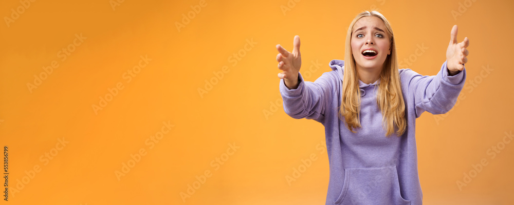 Excited fascinated glad blond woman adore singer performing stage ...
