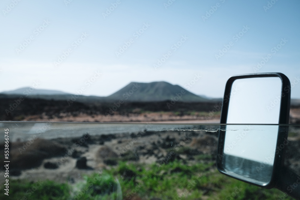 Roadtrip car window mirror view van campervan bus offroad mountains ...