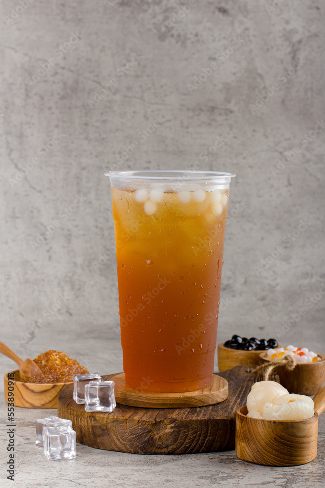 Boba or tapioca pearls is taiwan bubble milk tea in plastic cup with ...
