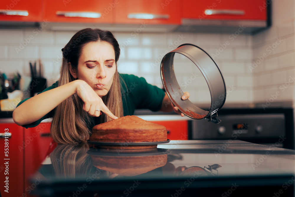 Woman Analyzing Uneven Cake with a Bump in the Middle. Perfectionist ...