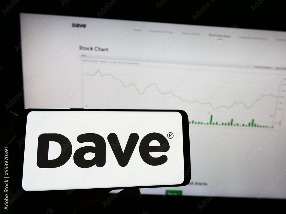 Stuttgart, Germany - 12-03-2022: Person holding mobile phone with logo ...