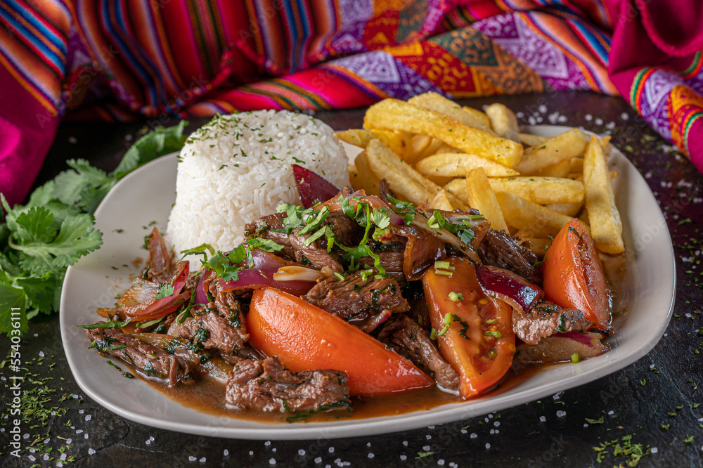 Lomo saltado, a traditional Peruvian stir fry that combines marinated ...