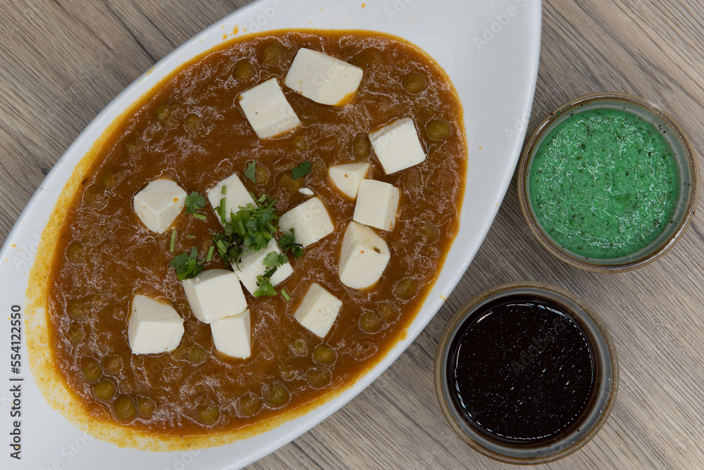 Overhead view of traditional Indian meal starts with a delicious bowl ...