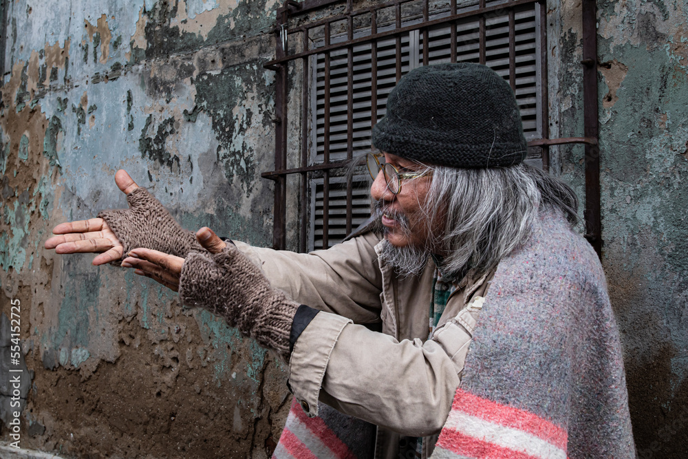 Homeless old man reaching out to passerby ask for money, need for help ...