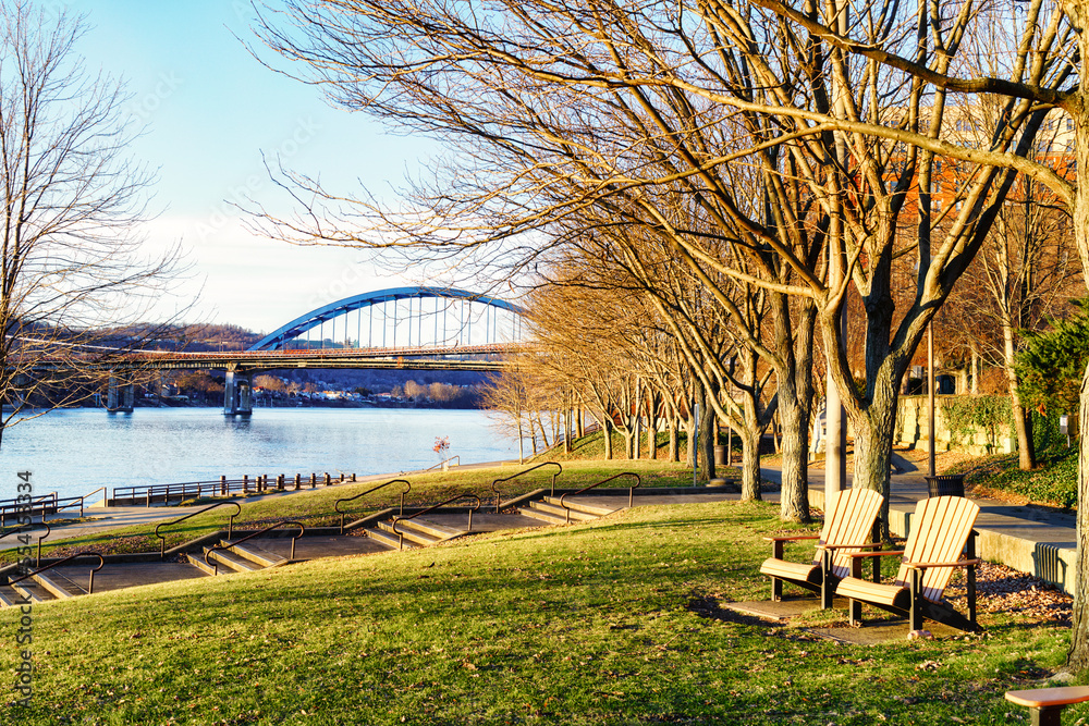 View of the Ohio River and landmark 1856 Wheeling Suspension Bridge and ...