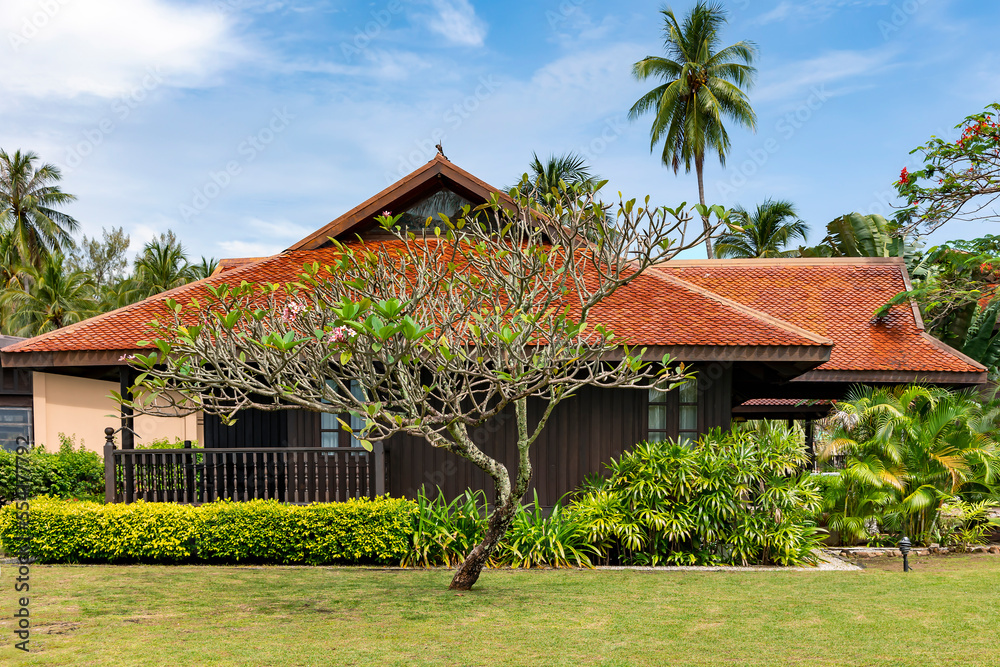 Malaysia, Langkawi, November, 2022: Wooden bungalow among a beautiful ...