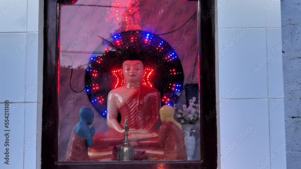 curious and unique static image of an electric Buddha that works with ...