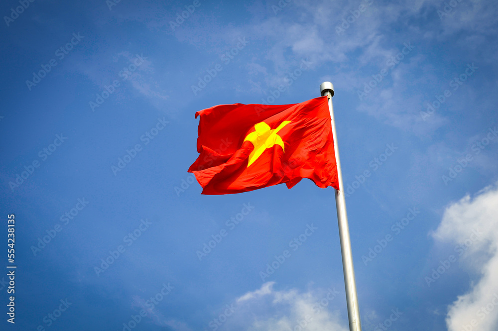 communist flag of Vietnam flutters Stock Photo | Adobe Stock