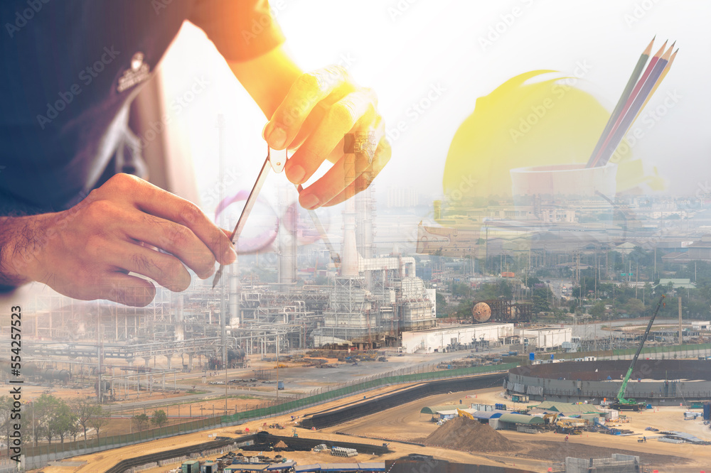 Engineers drawing Oil refinery and petrochemical plants Stock Photo ...