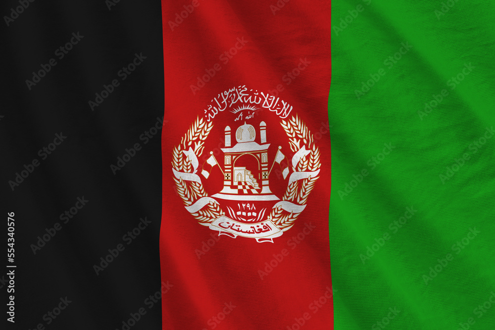Afghanistan flag with big folds waving close up under the studio light ...