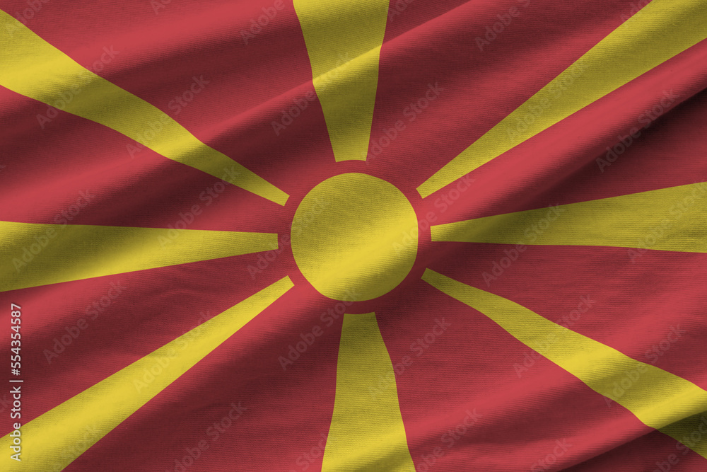 Macedonia flag with big folds waving close up under the studio light ...
