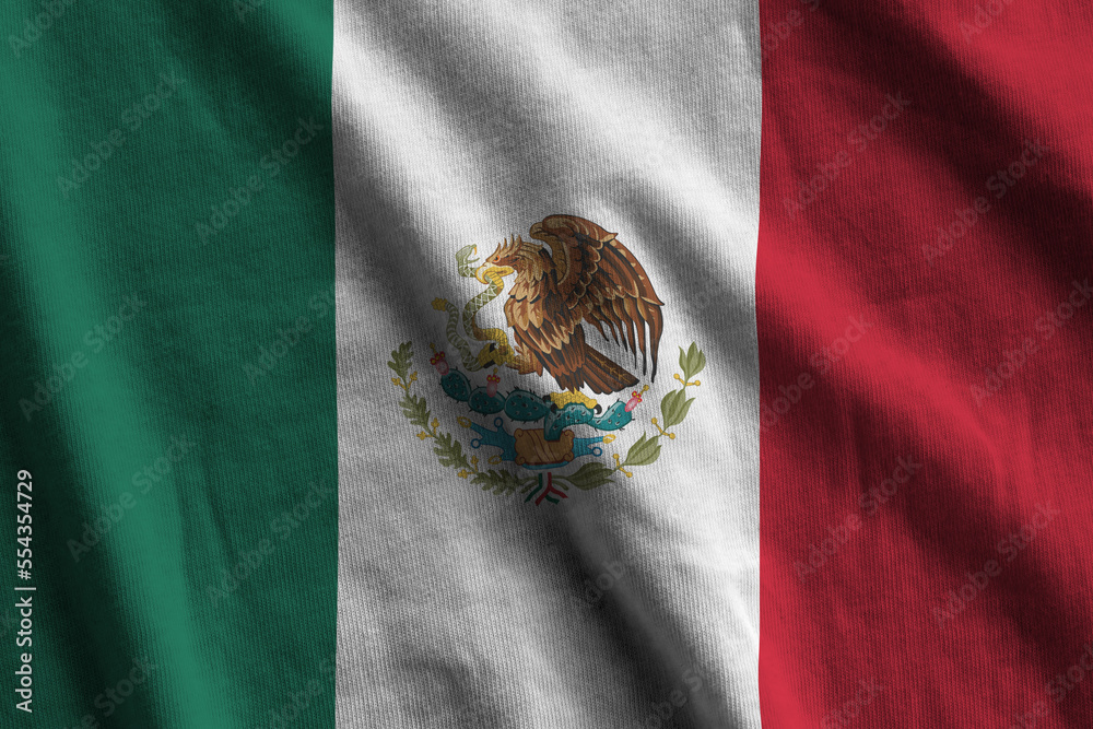 Mexico flag with big folds waving close up under the studio light ...