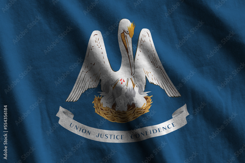 Louisiana US state flag with big folds waving close up under the studio ...
