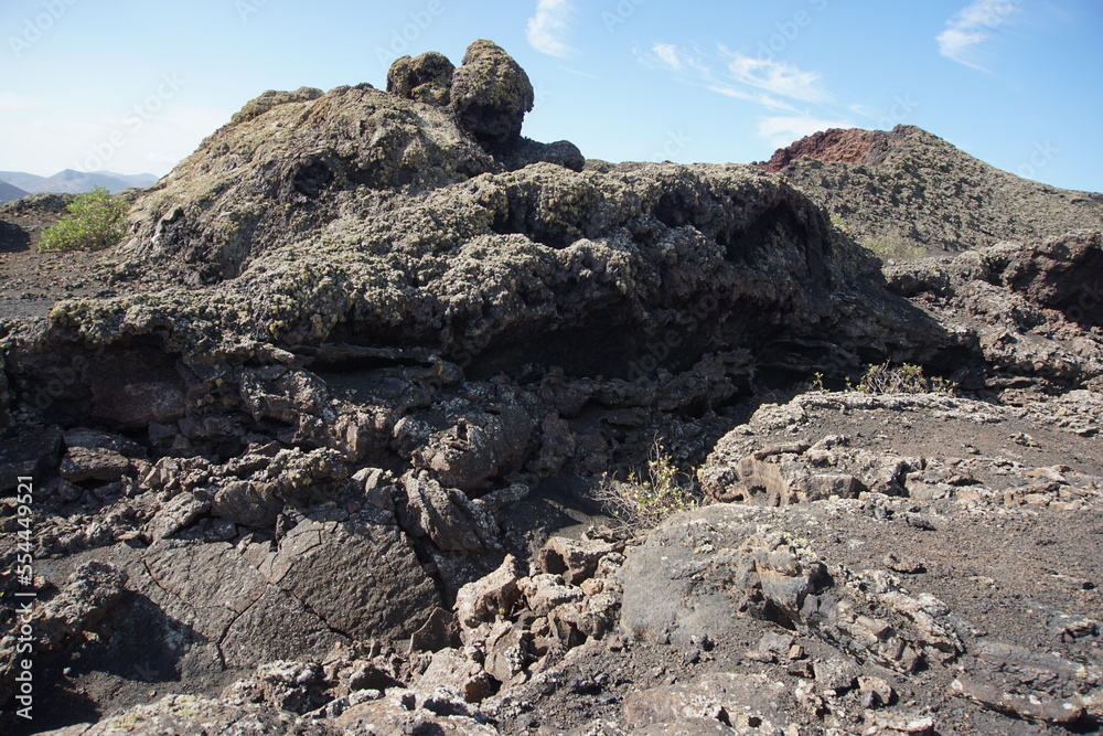 Volcanic landscapes of Lanzarote. Solidified lava, lava chimney, lava ...