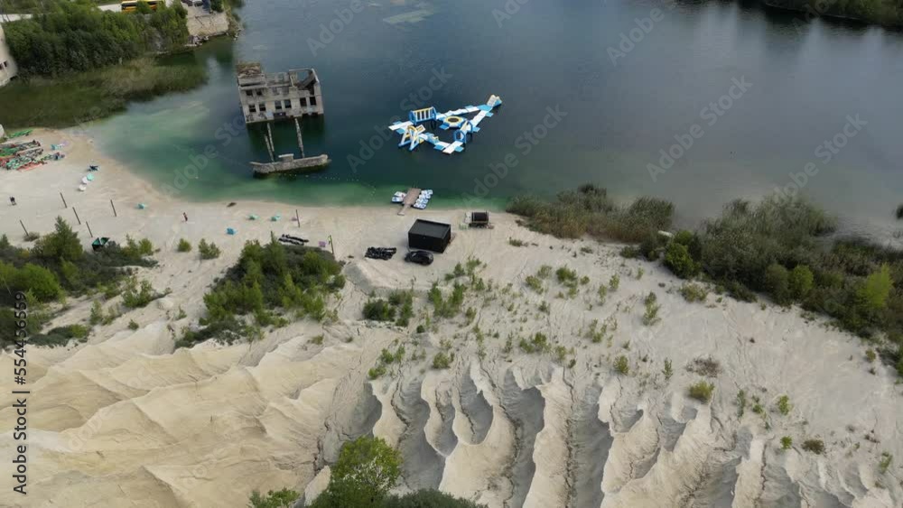 Abandoned Rummu quarry for extraction of limestone, turquoise lake with ...