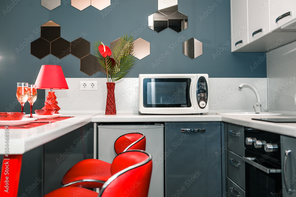 the interior of a modern kitchen in a hotel room with a countertop and ...
