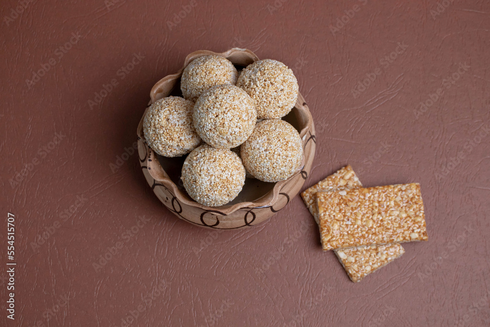 The indian sesame sweet or tilgul laddu, made up of jaggery and sesame ...
