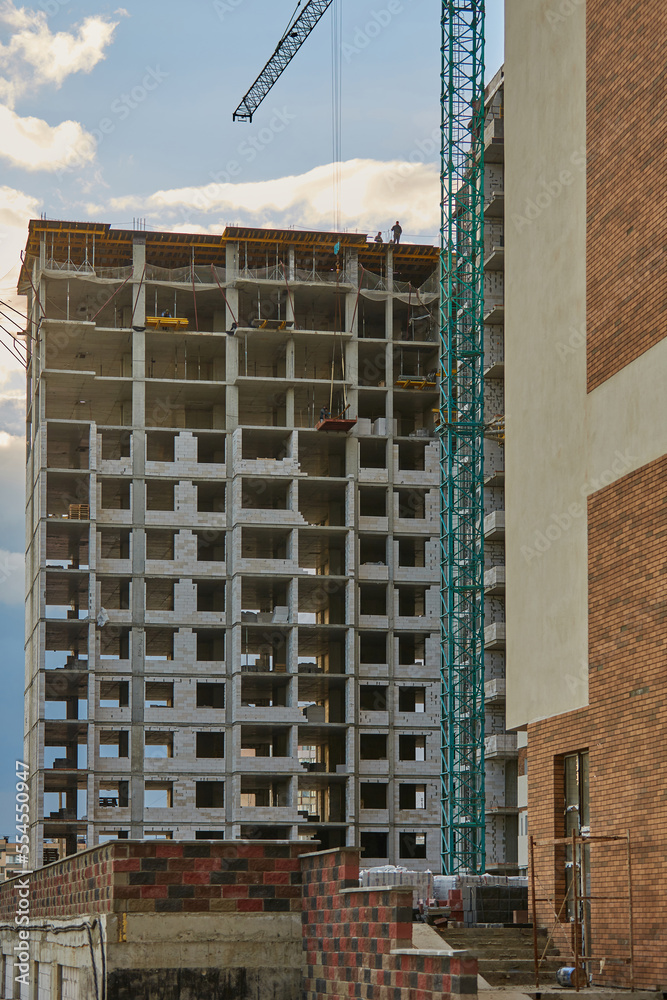 Construction site. High rise Building under construction. Construction ...