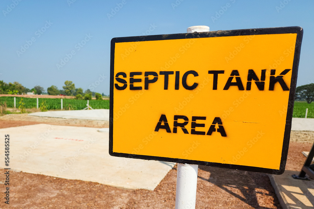 A septic tank storage area information sign at the construction site ...