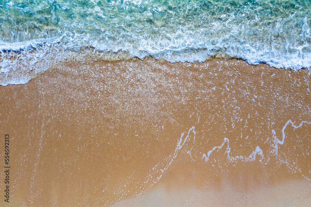Aerial top view photo taken by drone of Soft wave of emerald clear sea on sandy beach in andaman ...