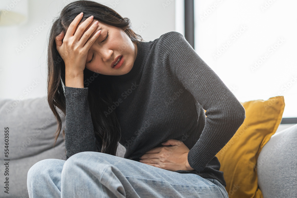 Poster, Foto Flatulence asian young woman, girl hand in stomach ache ...